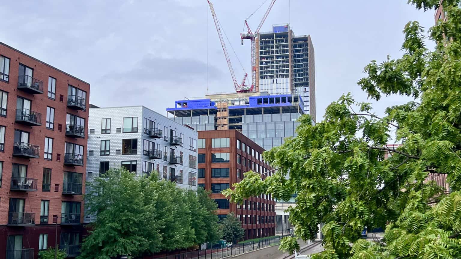 New Apartment Tower Reaches Its Highest Height - North Loop ...